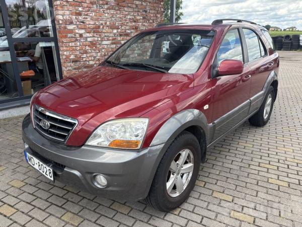 Red Kia Sorento 2010 in Talsi, with an engine capacity of 2.50 L and mileage of 259 thousand km for 2770 €, photo 1 on AUTOMOTO.COM.LV