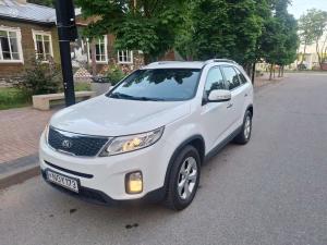 White Kia Sorento 2013 in Alytus, with an engine capacity of 2.20 L and mileage of 235 thousand km for 8300 €, photo 3 on AUTOMOTO.COM.LV