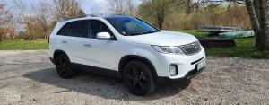 White Kia Sorento 2015 in Vilnius, with an engine capacity of 2.20 L and mileage of 165 thousand km for 8299 €, photo  on AUTOMOTO.COM.LV