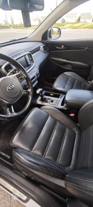 White Kia Sorento 2018 in Kaunas, with an engine capacity of 2.20 L and mileage of 194 thousand km for 16300 €, photo 13 on AUTOMOTO.COM.LV