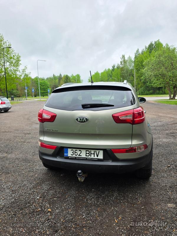 Beige Kia Sportage 2012 in Tallinn, with an engine capacity of 2.00 L and mileage of 196 thousand km for 7900 €, photo 5 on AUTOMOTO.COM.LV