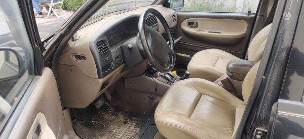 Киа Sportage 2002 в Мажейкяй на AUTOMOTO.COM.LV Черный Киа Sportage 2002 в Мажейкяй, объемом двигателя 2.00 л и пробегом 96 тыс. км за 450 €, фото 3 на AUTOMOTO.COM.LV