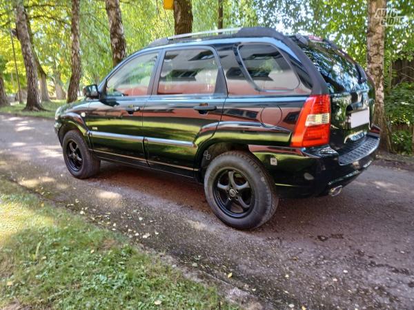 Melns Kia Sportage 2005 Telšiai, ar dzinēja tilpumu 2.70 L un nobraukumu 269 tūkst. km par 1650 €, foto 2 vietnē AUTOMOTO.COM.LV