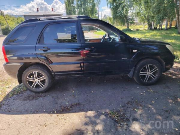 Black Kia Sportage 2005 in Riga, with an engine capacity of 2.50 L and mileage of 255 thousand km for 1500 €, photo 5 on AUTOMOTO.COM.LV