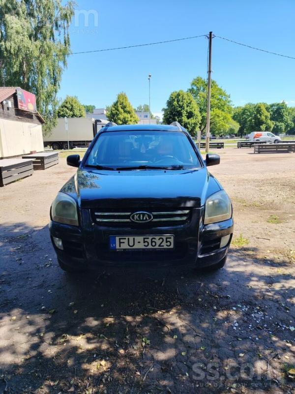 Black Kia Sportage 2005 in Riga, with an engine capacity of 2.50 L and mileage of 255 thousand km for 1500 €, photo 6 on AUTOMOTO.COM.LV