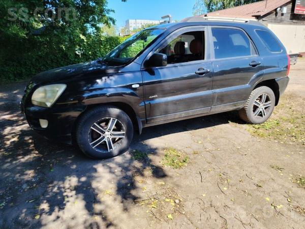 Black Kia Sportage 2005 in Riga, with an engine capacity of 2.50 L and mileage of 255 thousand km for 1500 €, photo 7 on AUTOMOTO.COM.LV