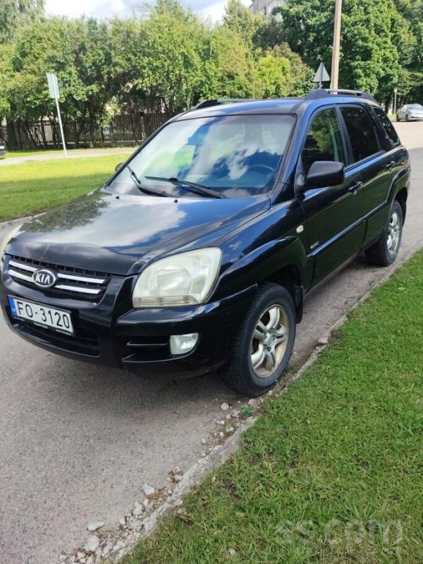 Melns Kia Sportage 2005 Rīga, ar dzinēja tilpumu 2.70 L un nobraukumu 204 tūkst. km par 1980 €, foto 1 vietnē AUTOMOTO.COM.LV