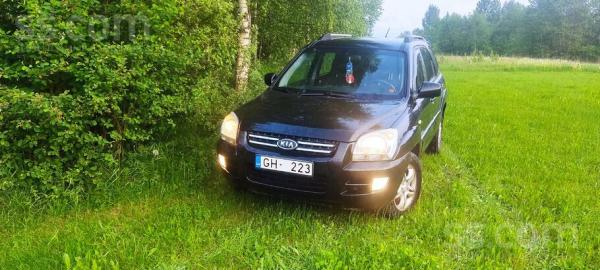 Black Kia Sportage 2006 in Rezekne, with an engine capacity of 2.00 L and mileage of 245 thousand km for 2950 €, photo 10 on AUTOMOTO.COM.LV