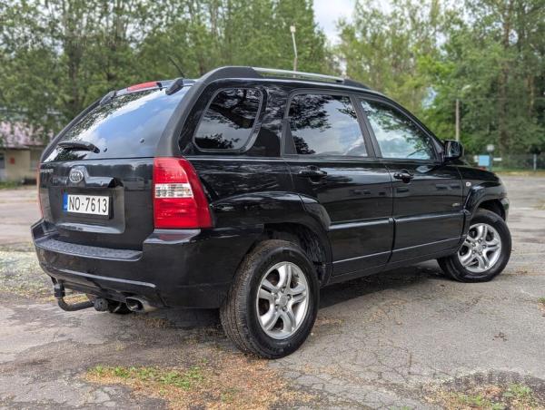 Black Kia Sportage 2006 in Riga, with an engine capacity of 2.00 L and mileage of 0 thousand km for 6750 €, photo 7 on AUTOMOTO.COM.LV