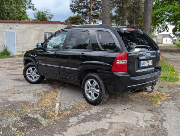 Black Kia Sportage 2006 in Riga, with an engine capacity of 2.00 L and mileage of 0 thousand km for 6750 €, photo 9 on AUTOMOTO.COM.LV
