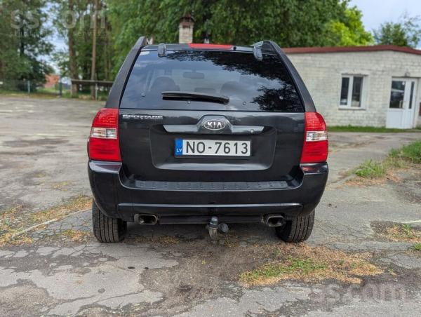 Black Kia Sportage 2006 in Riga, with an engine capacity of 2.00 L and mileage of 0 thousand km for 6750 €, photo 10 on AUTOMOTO.COM.LV