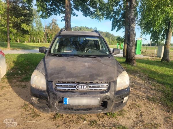 Black Kia Sportage 2006 in Vilnius, with an engine capacity of 2.00 L and mileage of 226 thousand km for 1350 €, photo 2 on AUTOMOTO.COM.LV