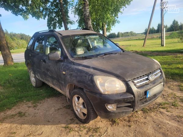 Black Kia Sportage 2006 in Vilnius, with an engine capacity of 2.00 L and mileage of 226 thousand km for 1350 €, photo 3 on AUTOMOTO.COM.LV