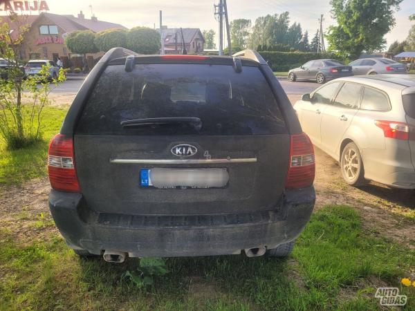Black Kia Sportage 2006 in Vilnius, with an engine capacity of 2.00 L and mileage of 226 thousand km for 1350 €, photo 5 on AUTOMOTO.COM.LV