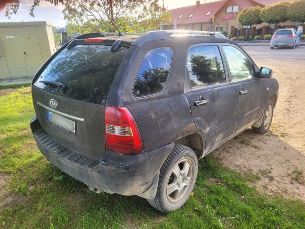 Black Kia Sportage 2006 in Vilnius, with an engine capacity of 2.00 L and mileage of 226 thousand km for 1350 €, photo 6 on AUTOMOTO.COM.LV