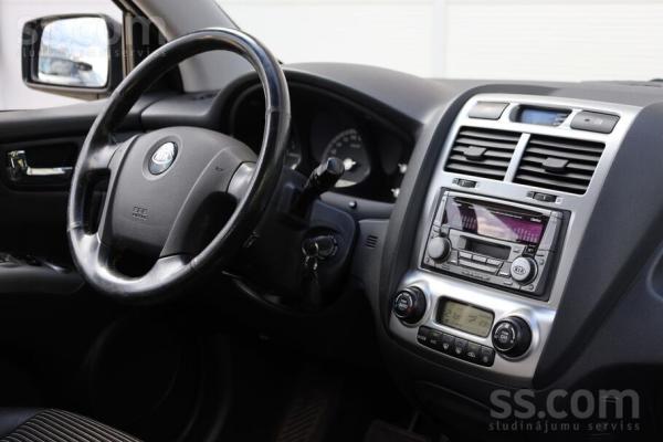 Black Kia Sportage 2006 in Riga, with an engine capacity of 2.00 L and mileage of 271 thousand km for 2495 €, photo 10 on AUTOMOTO.COM.LV