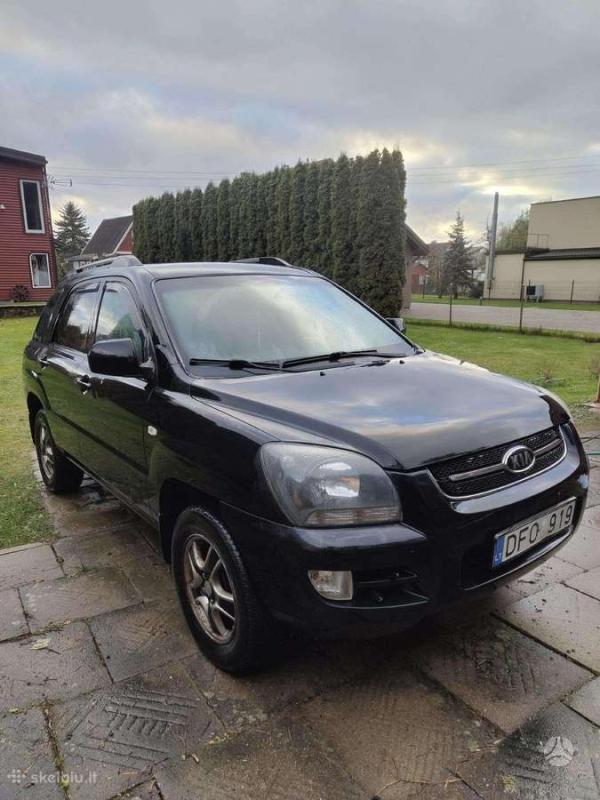 Black Kia Sportage 2007 in Kaunas, with an engine capacity of 2.00 L and mileage of 272 thousand km for 1499 €, photo 1 on AUTOMOTO.COM.LV
