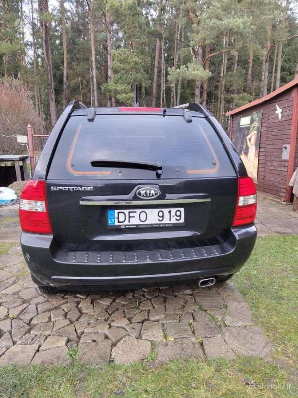 Black Kia Sportage 2007 in Kaunas, with an engine capacity of 2.00 L and mileage of 272 thousand km for 1499 €, photo 4 on AUTOMOTO.COM.LV
