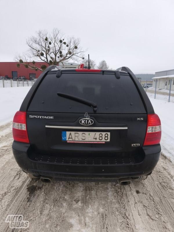 Melns Kia Sportage 2007 Kauņa, ar dzinēja tilpumu 2.70 L un nobraukumu 294 tūkst. km par 1999 €, foto 5 vietnē AUTOMOTO.COM.LV