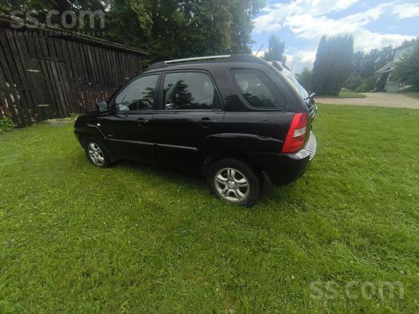 Melns Kia Sportage 2007 Liepāja, ar dzinēja tilpumu 2.00 L un nobraukumu 186 tūkst. km par 2000 €, foto 3 vietnē AUTOMOTO.COM.LV