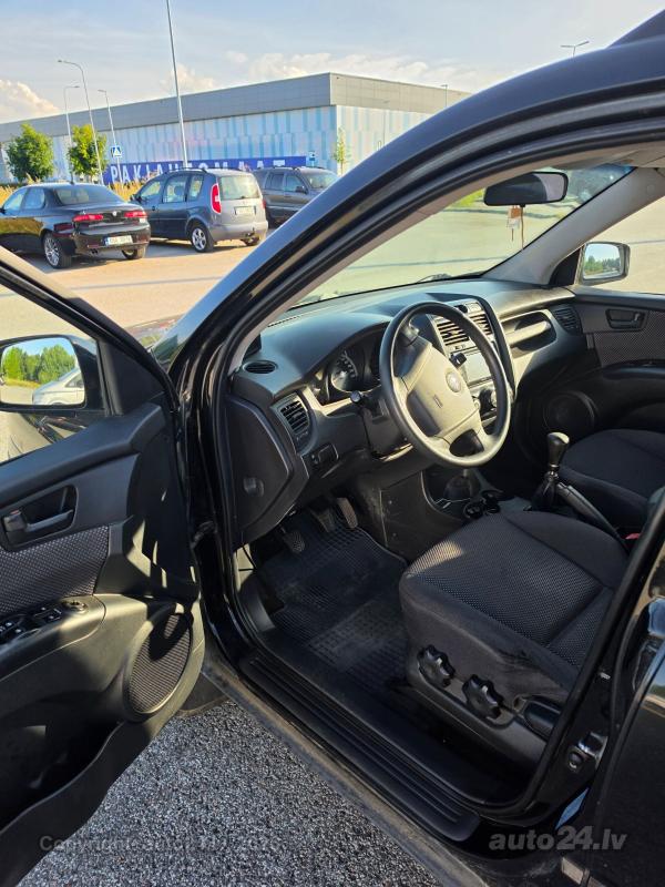 Melns Kia Sportage 2007 Tallina, ar dzinēja tilpumu 2.00 L un nobraukumu 286 tūkst. km par 1399 €, foto 10 vietnē AUTOMOTO.COM.LV