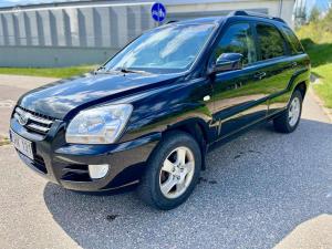Black Kia Sportage 2007 in Vilnius, with an engine capacity of 1.99 L and mileage of 189 thousand km for 2999 €, photo  on AUTOMOTO.COM.LV