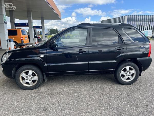 Black Kia Sportage 2007 in Vilnius, with an engine capacity of 2.00 L and mileage of 189 thousand km for 2900 €, photo 3 on AUTOMOTO.COM.LV