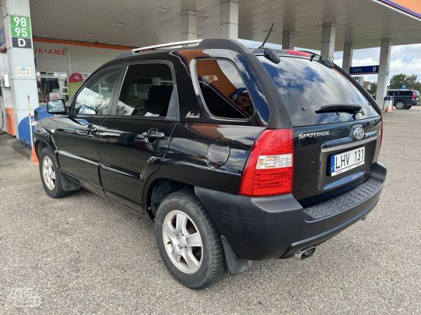 Black Kia Sportage 2007 in Vilnius, with an engine capacity of 2.00 L and mileage of 189 thousand km for 2900 €, photo 4 on AUTOMOTO.COM.LV
