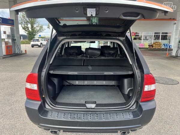 Black Kia Sportage 2007 in Vilnius, with an engine capacity of 2.00 L and mileage of 189 thousand km for 2900 €, photo 6 on AUTOMOTO.COM.LV
