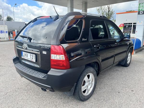 Black Kia Sportage 2007 in Vilnius, with an engine capacity of 2.00 L and mileage of 189 thousand km for 2900 €, photo 7 on AUTOMOTO.COM.LV