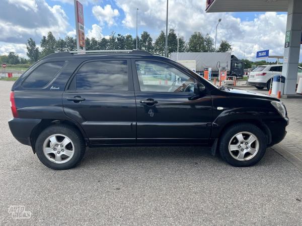 Black Kia Sportage 2007 in Vilnius, with an engine capacity of 2.00 L and mileage of 189 thousand km for 2900 €, photo 8 on AUTOMOTO.COM.LV