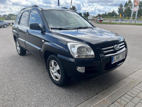 Black Kia Sportage 2007 in Vilnius, with an engine capacity of 2.00 L and mileage of 189 thousand km for 2900 €, photo 9 on AUTOMOTO.COM.LV