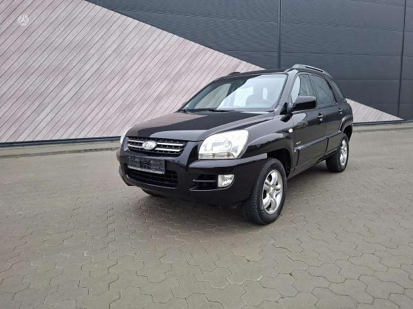 Black Kia Sportage 2008 in Panevezys, with an engine capacity of 1.98 L and mileage of 248 thousand km for 3247 €, photo 1 on AUTOMOTO.COM.LV