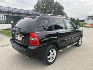 Black Kia Sportage 2008 in Vilnius, with an engine capacity of 1.98 L and mileage of 186 thousand km for 2650 €, photo  on AUTOMOTO.COM.LV