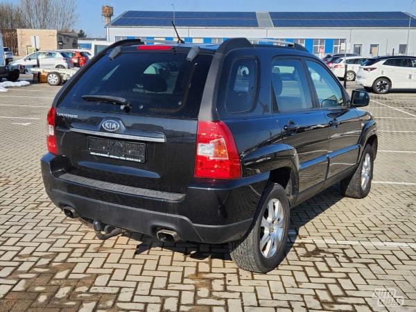 Melns Kia Sportage 2009 Tauragė, ar dzinēja tilpumu 2.00 L un nobraukumu 225 tūkst. km par 3650 €, foto 4 vietnē AUTOMOTO.COM.LV
