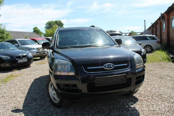 Melns Kia Sportage 2009 Daugavpils, ar dzinēja tilpumu 2.00 L un nobraukumu 221 tūkst. km par 3890 €, foto 1 vietnē AUTOMOTO.COM.LV