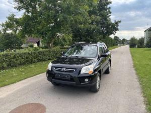 Black Kia Sportage 2009 in Jurbarkas, with an engine capacity of 1.99 L and mileage of 232 thousand km for 3300 €, photo  on AUTOMOTO.COM.LV