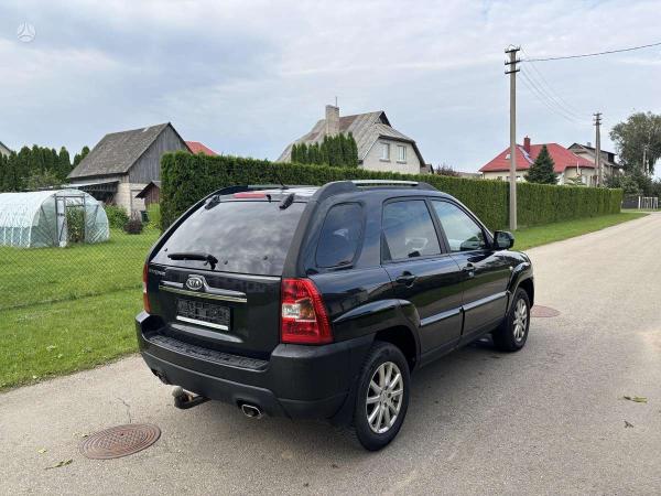 Melns Kia Sportage 2009 Jurbarkas, ar dzinēja tilpumu 1.99 L un nobraukumu 232 tūkst. km par 3300 €, foto 5 vietnē AUTOMOTO.COM.LV