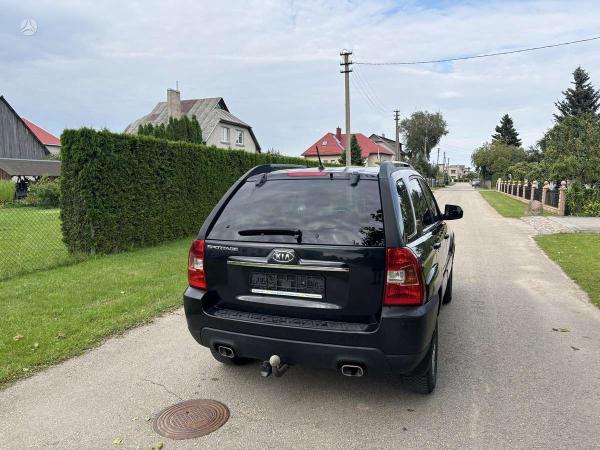 Melns Kia Sportage 2009 Jurbarkas, ar dzinēja tilpumu 1.99 L un nobraukumu 232 tūkst. km par 3300 €, foto 6 vietnē AUTOMOTO.COM.LV