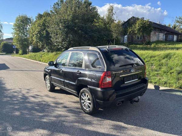 Black Kia Sportage 2009 in Jurbarkas, with an engine capacity of 1.99 L and mileage of 232 thousand km for 3200 €, photo 7 on AUTOMOTO.COM.LV