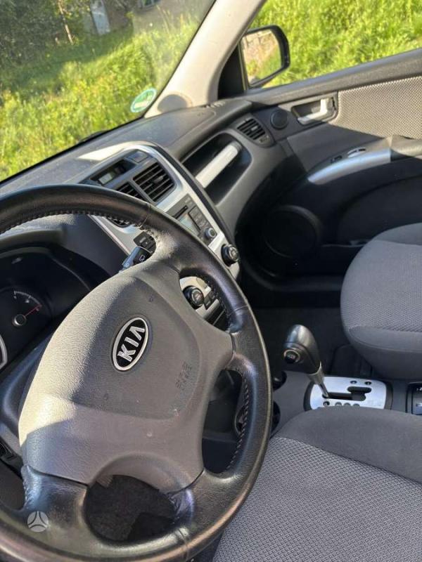 Melns Kia Sportage 2009 Jurbarkas, ar dzinēja tilpumu 1.99 L un nobraukumu 232 tūkst. km par 3100 €, foto 11 vietnē AUTOMOTO.COM.LV