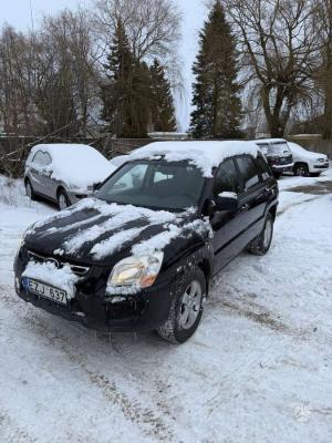 Black Kia Sportage 2010 in Pasvalys, with an engine capacity of 2.00 L and mileage of 119 thousand km for 3950 €, photo  on AUTOMOTO.COM.LV