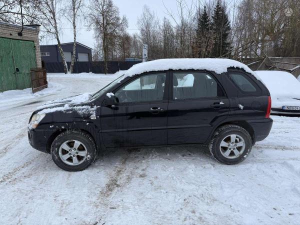 Melns Kia Sportage 2010 Pasvalys, ar dzinēja tilpumu 2.00 L un nobraukumu 119 tūkst. km par 3950 €, foto 5 vietnē AUTOMOTO.COM.LV