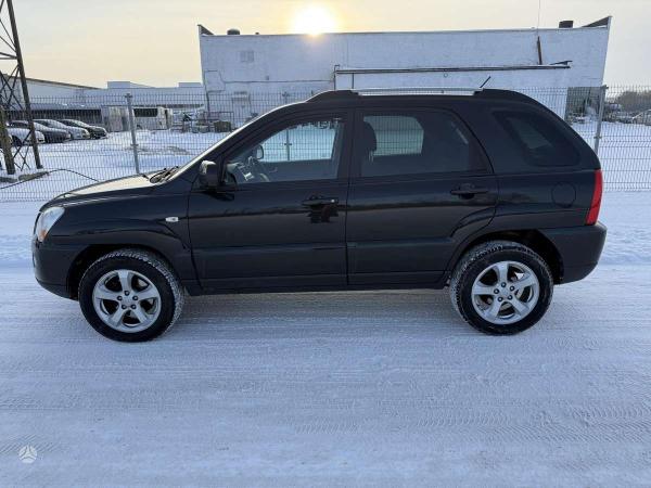 Black Kia Sportage 2010 in Marijampole, with an engine capacity of 2.00 L and mileage of 122 thousand km for 4700 €, photo 2 on AUTOMOTO.COM.LV