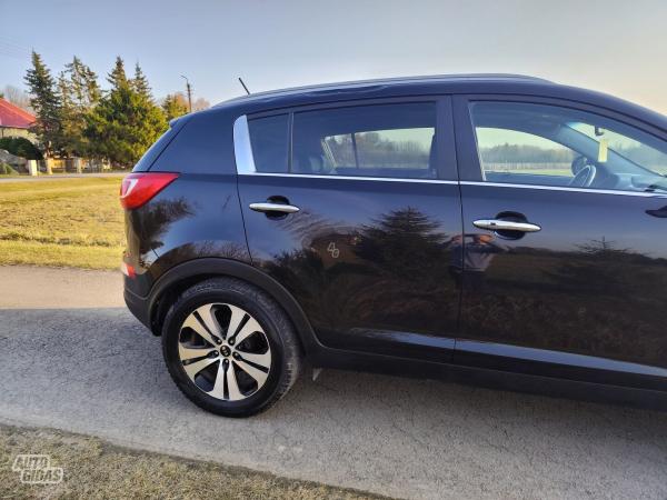 Black Kia Sportage 2010 in Pasvalys, with an engine capacity of 2.00 L and mileage of 209 thousand km for 7200 €, photo 8 on AUTOMOTO.COM.LV