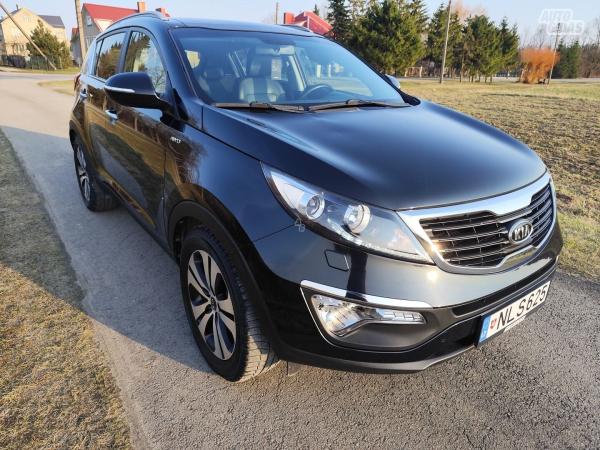 Black Kia Sportage 2010 in Pasvalys, with an engine capacity of 2.00 L and mileage of 209 thousand km for 7200 €, photo 10 on AUTOMOTO.COM.LV