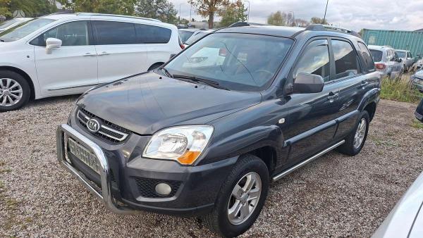 Black Kia Sportage 2010 in Kaunas, with an engine capacity of 1.99 L and mileage of 178 thousand km for 3750 €, photo 4 on AUTOMOTO.COM.LV