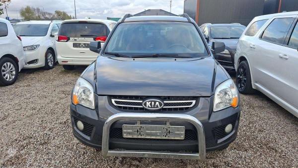 Black Kia Sportage 2010 in Kaunas, with an engine capacity of 1.99 L and mileage of 178 thousand km for 3750 €, photo 6 on AUTOMOTO.COM.LV