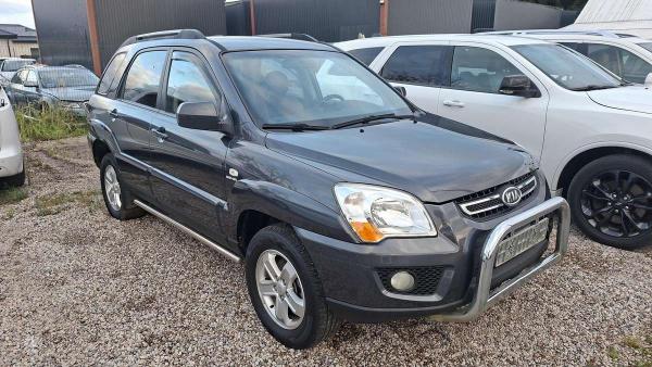 Black Kia Sportage 2010 in Kaunas, with an engine capacity of 1.99 L and mileage of 178 thousand km for 3750 €, photo 7 on AUTOMOTO.COM.LV