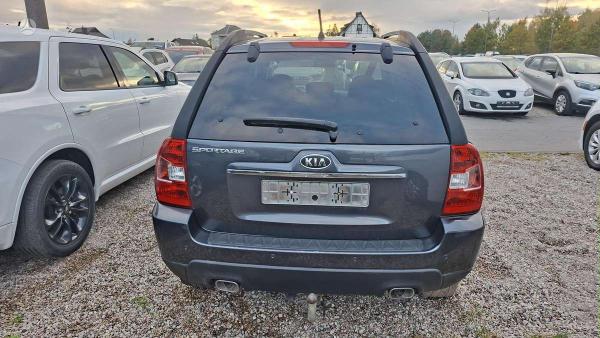 Black Kia Sportage 2010 in Kaunas, with an engine capacity of 1.99 L and mileage of 178 thousand km for 3750 €, photo 10 on AUTOMOTO.COM.LV